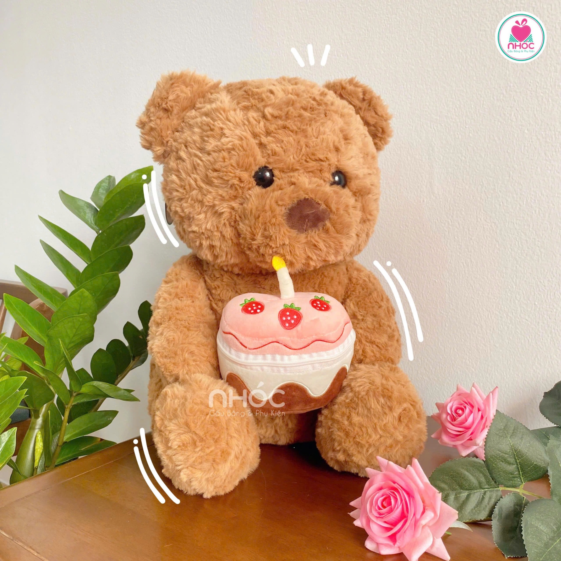 Gấu teddy ôm quà tặng lông xù ngồi