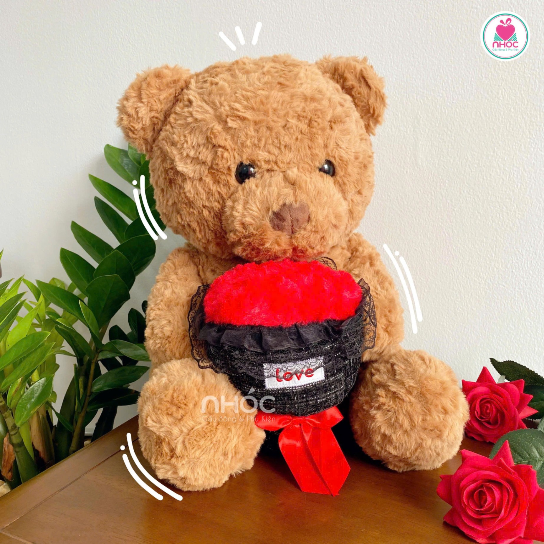 Gấu teddy ôm quà tặng lông xù ngồi