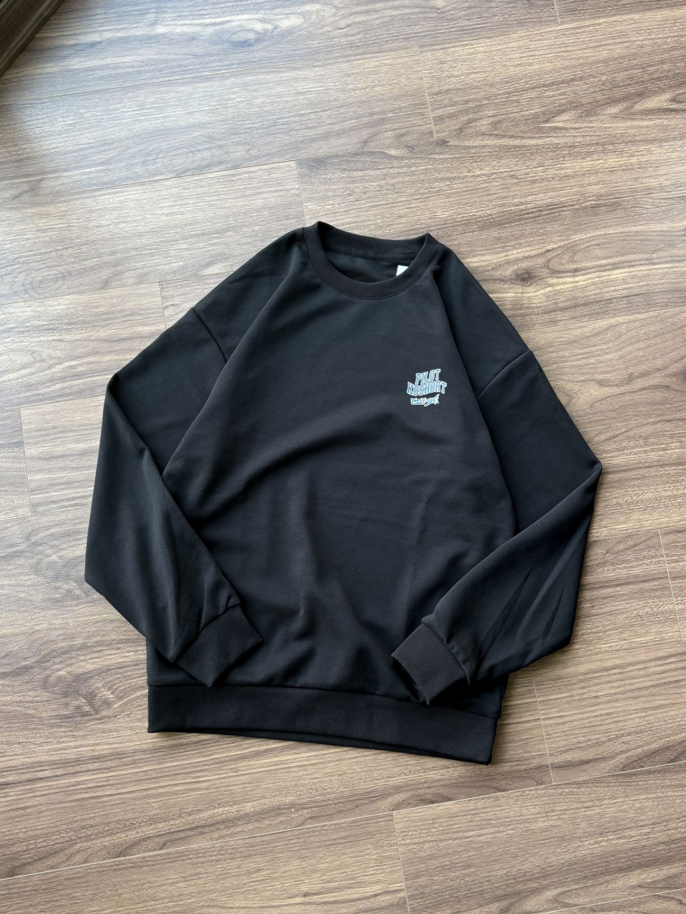 Polham Sweater Koshort Text