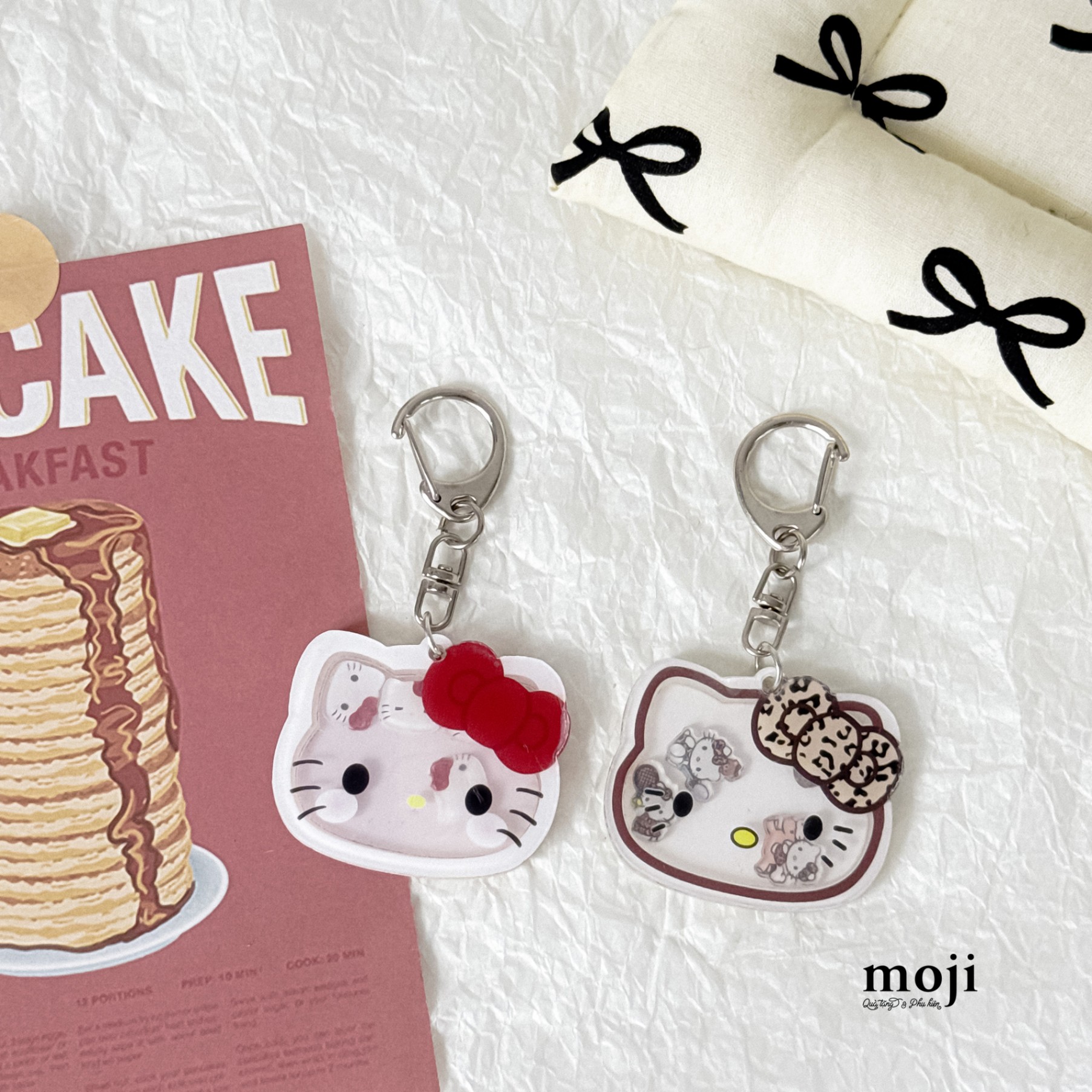 B.05C Móc khóa Sanrio Hello Kitty face lắc vui nhộn có tiếng